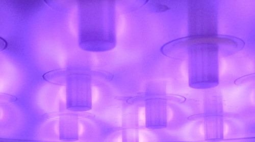 Distributed microwave plasma sources for large scale processing